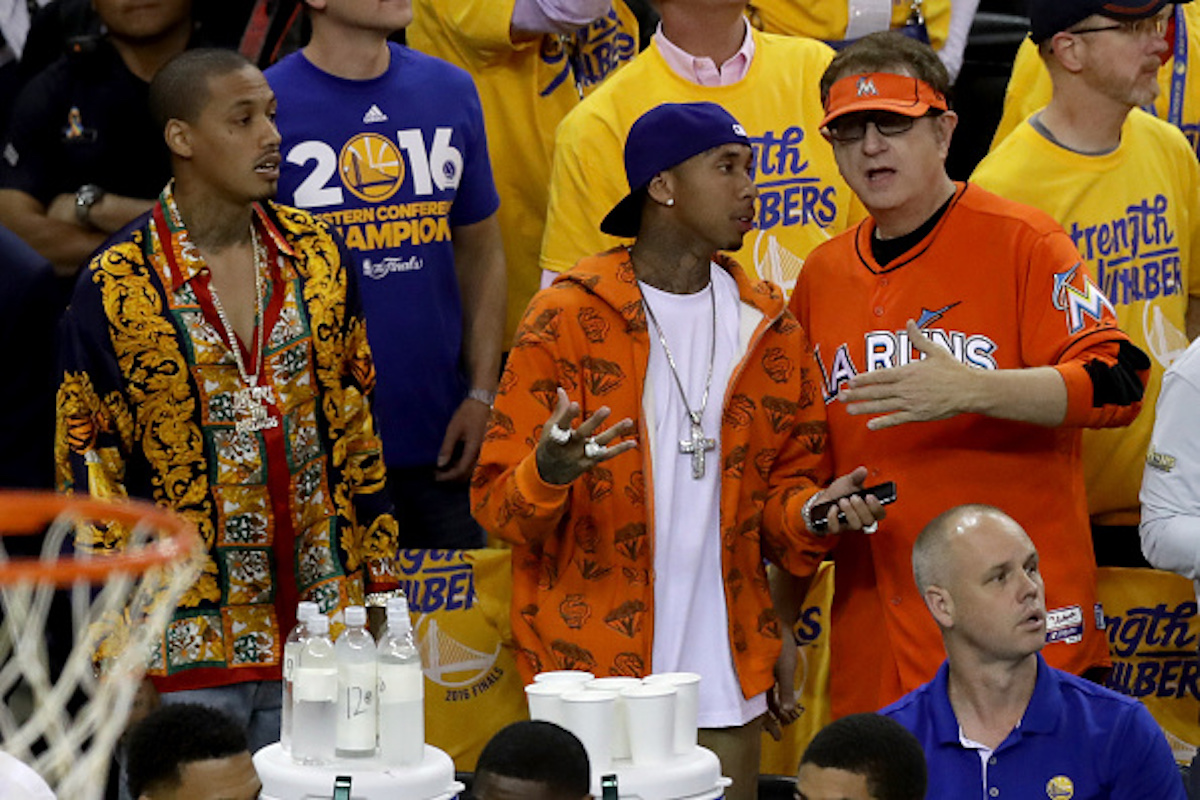 Why do fans wear gear to a game for a team that isn’t even playing in ...